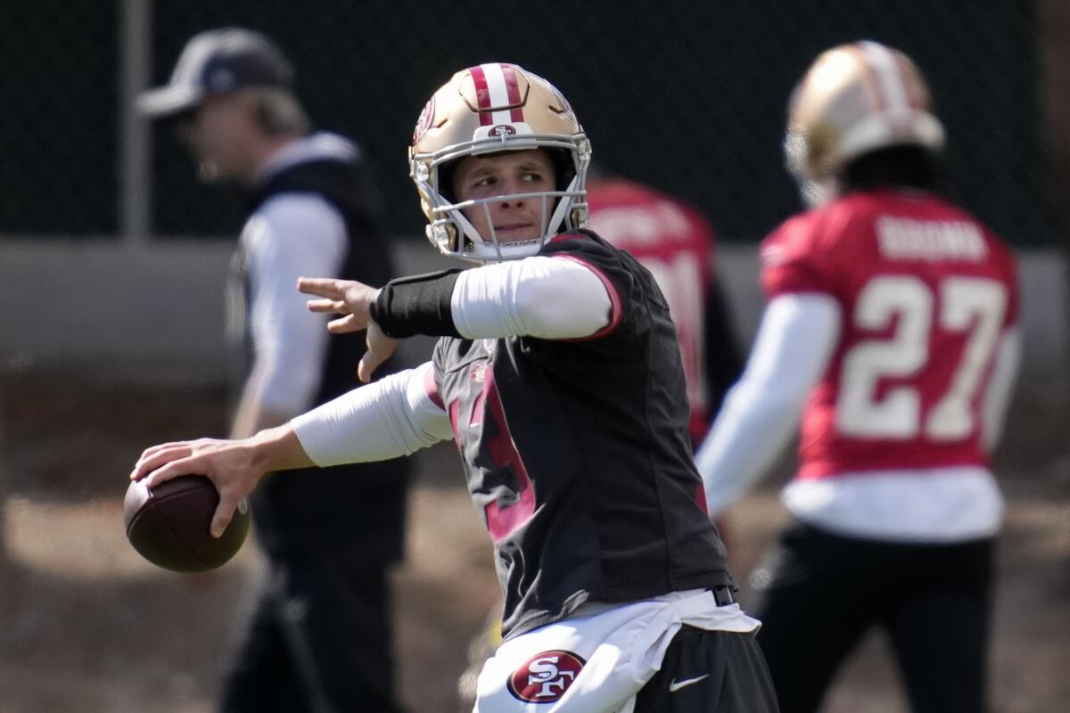 Brock Purdy and McCaffrey: The 49ers' Path to Victory